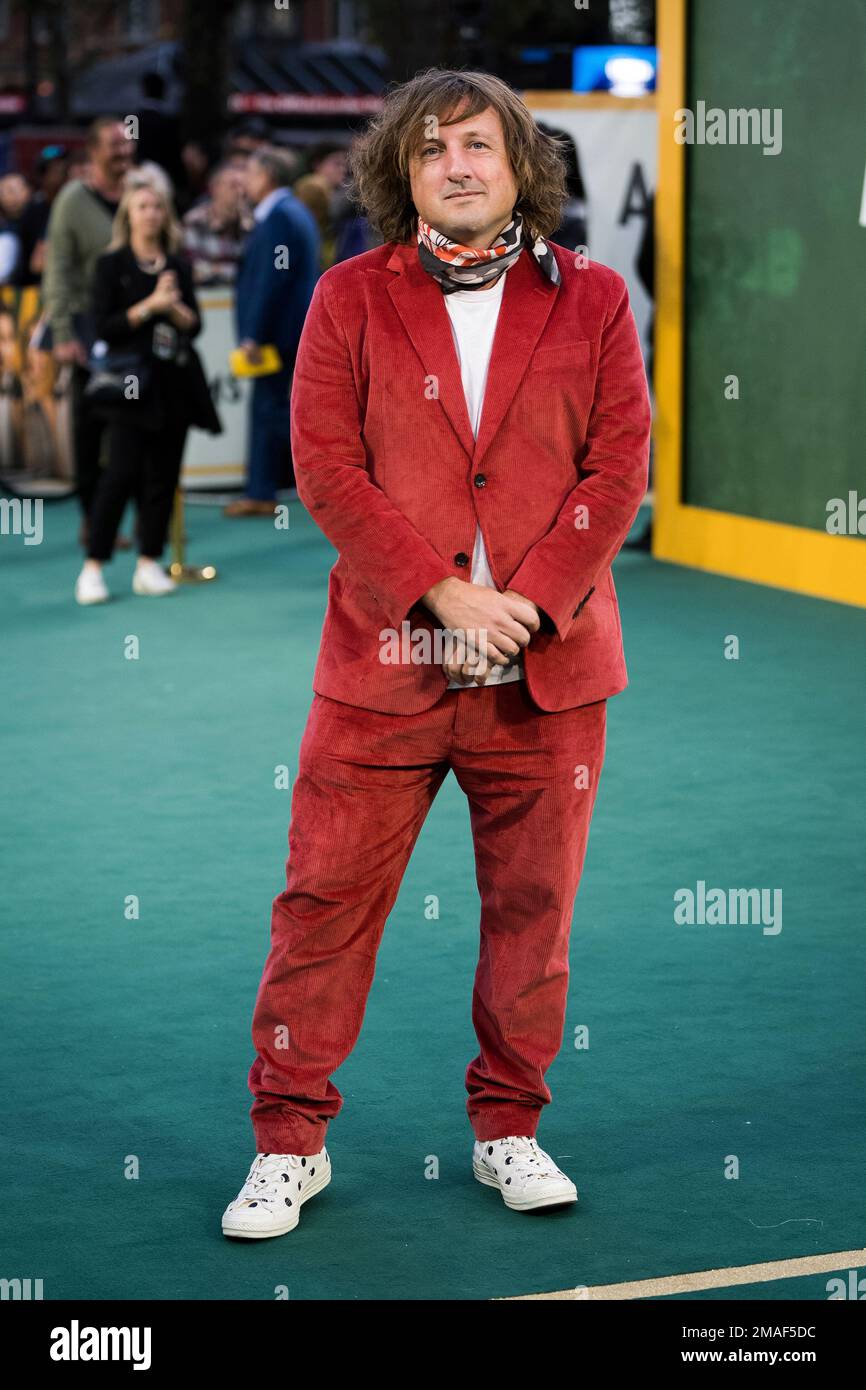 Daniel Pemberton poses for photographers upon arrival for the premiere ...