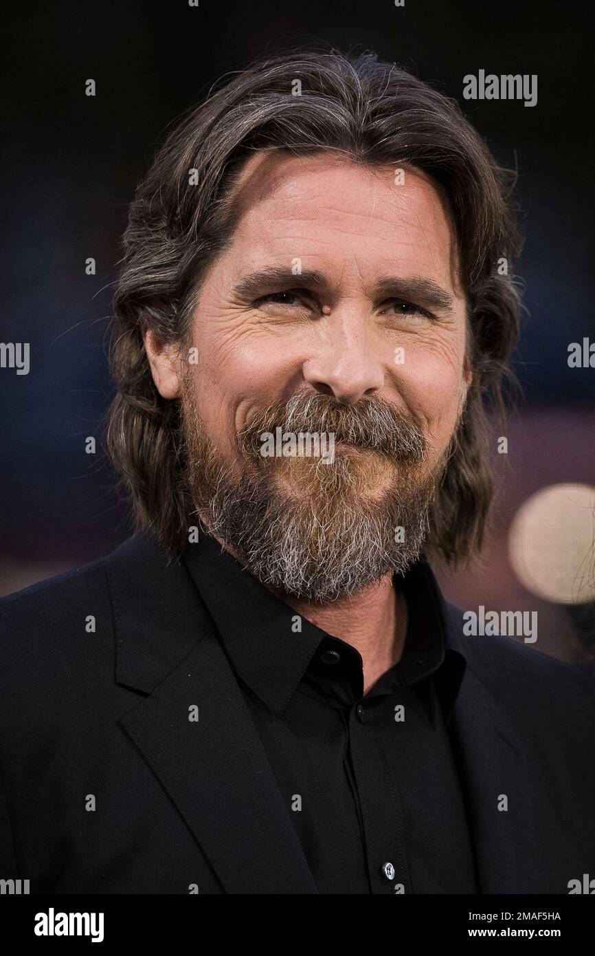Christian Bale poses for photographers upon arrival for the premiere of ...