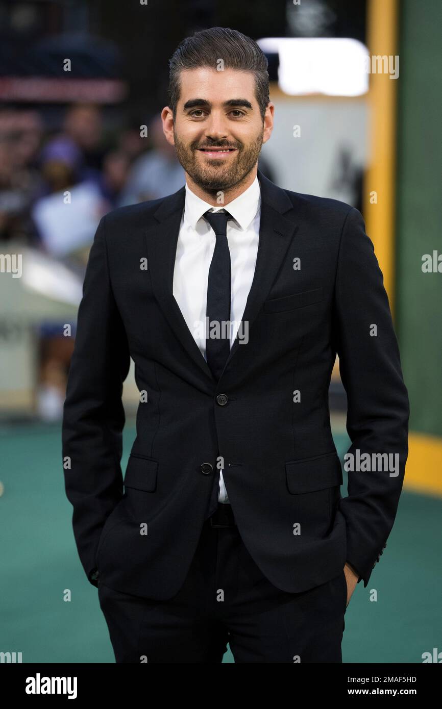 Matthew Budman poses for photographers upon arrival for the premiere of ...
