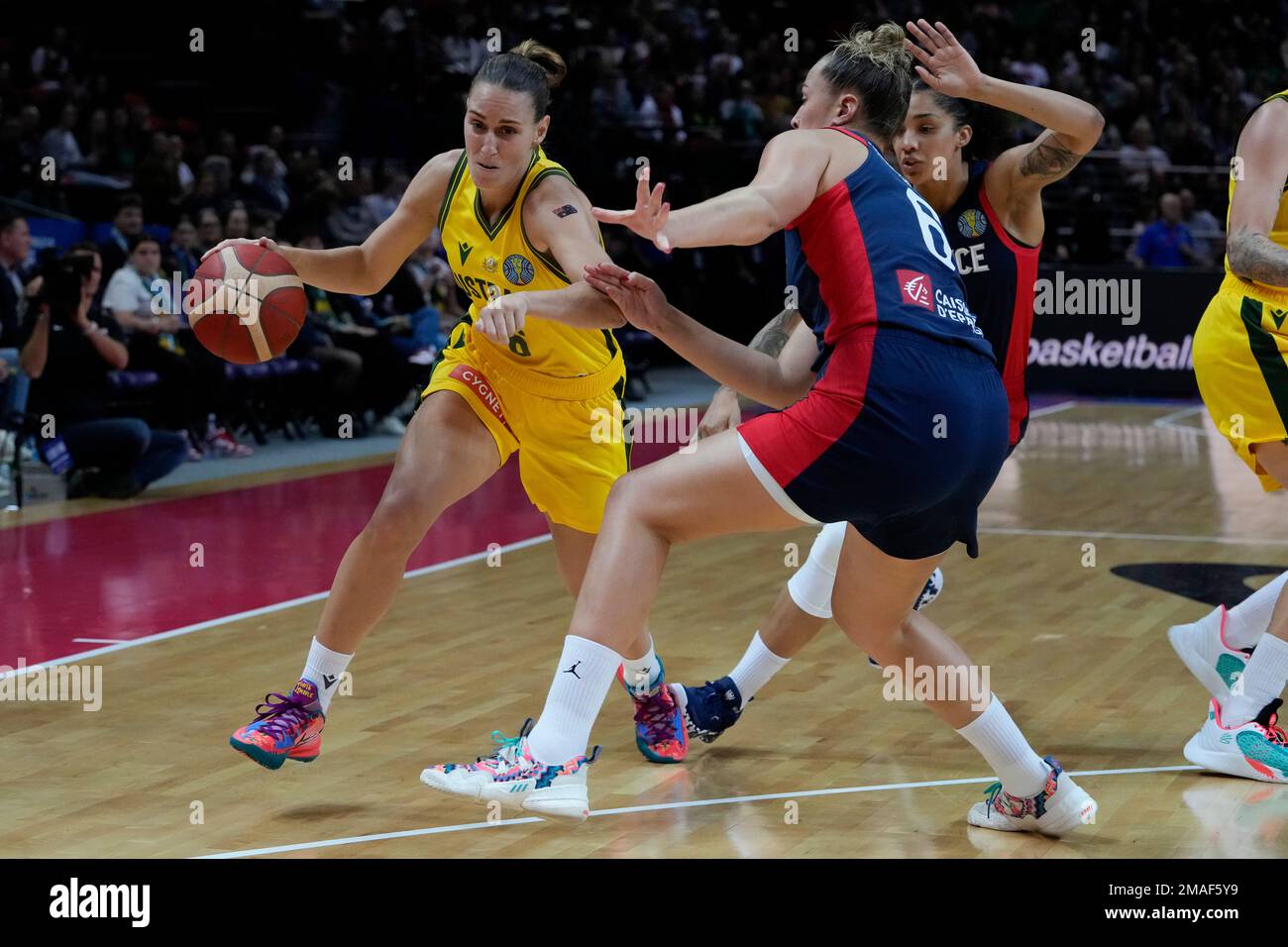 Australia's Steph Talbot, left, pushes past France's Marine Johannes ...