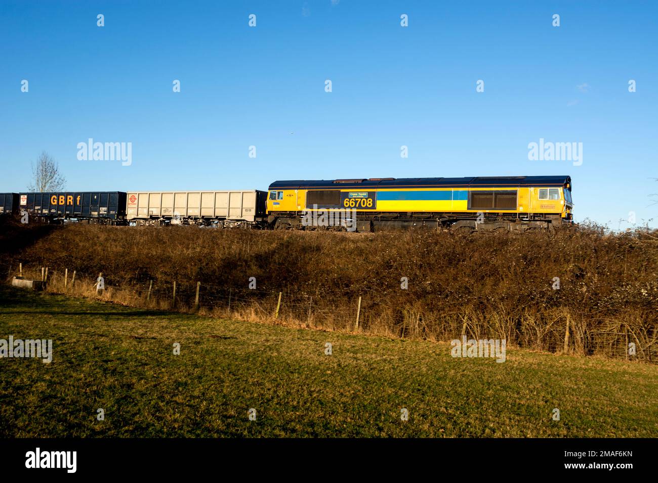 Class 66 diesel locomotive No. 66708 "Glory to Ukraine" pulling a ...
