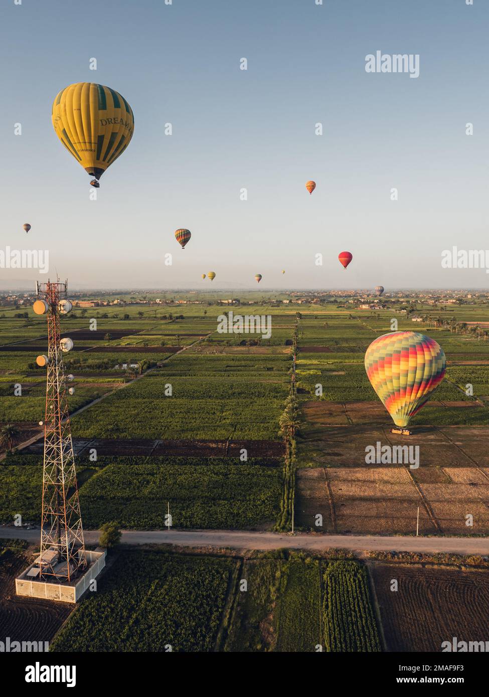 Aerial view of the agricultural fields and Luxor and balloons from a ...