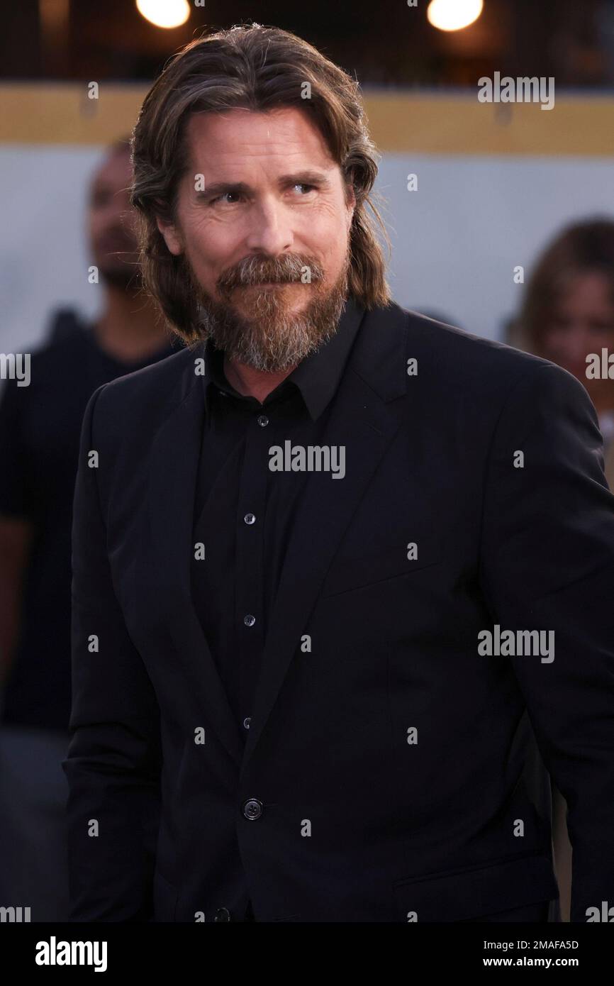 Christian Bale poses for photographers upon arrival for the premiere of ...