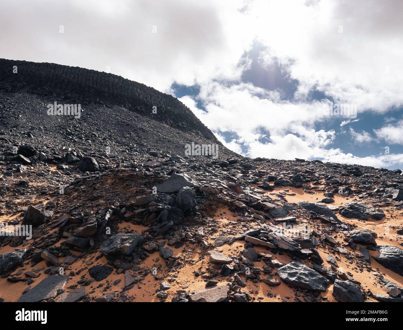 A volcanic hill in the Black Desert, Egypt Stock Photo - Alamy
