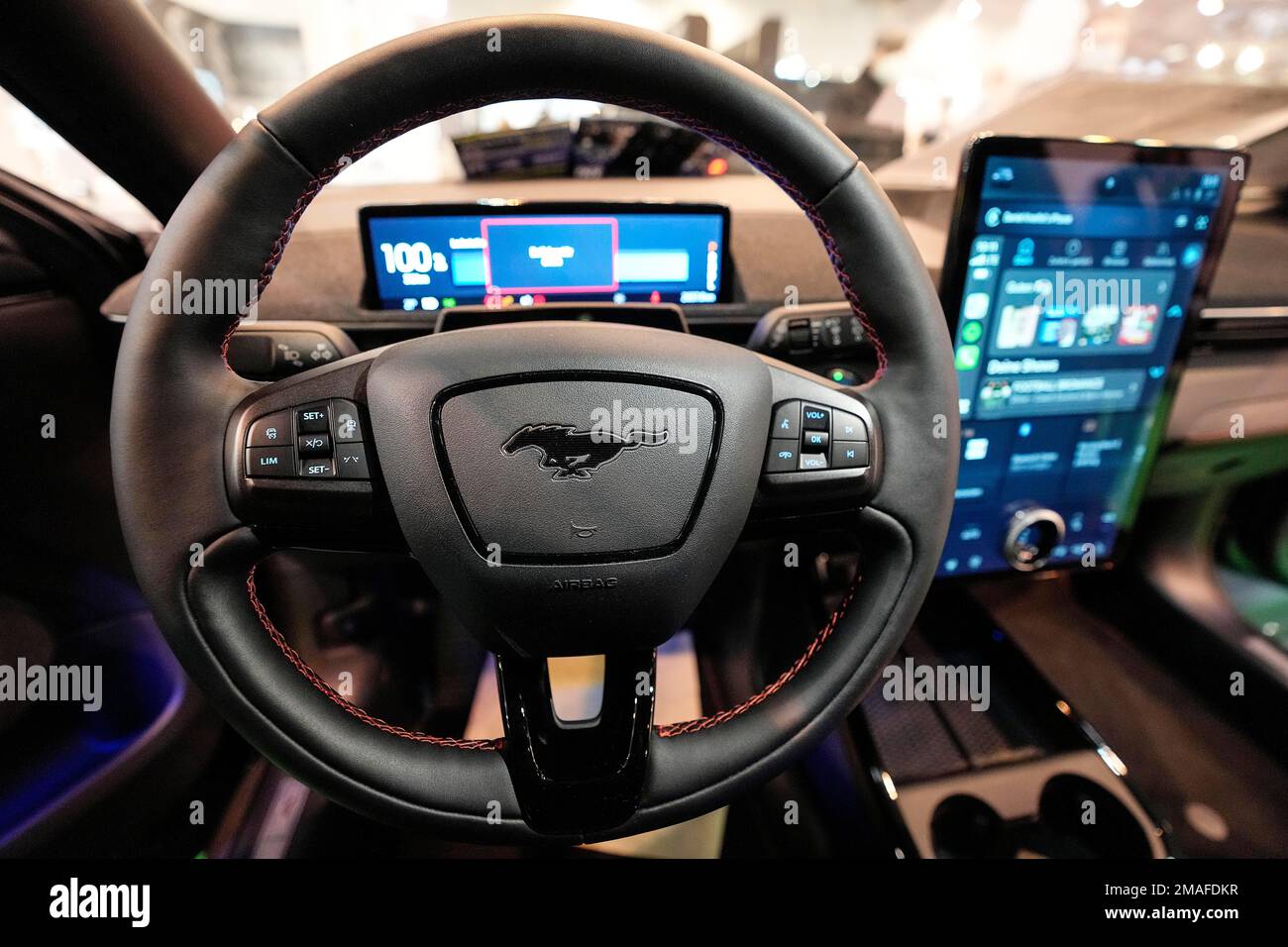 FILE - The cockpit of a Ford Mustang Mach-E electric car is pictured at ...