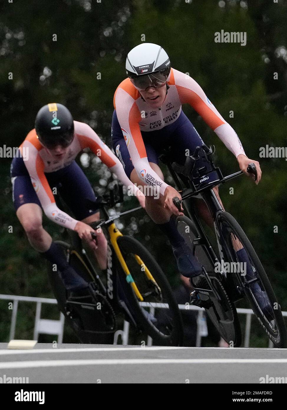 Netherlands' riders Ellen Van Dijk, right, and Riejanne Markus compete ...