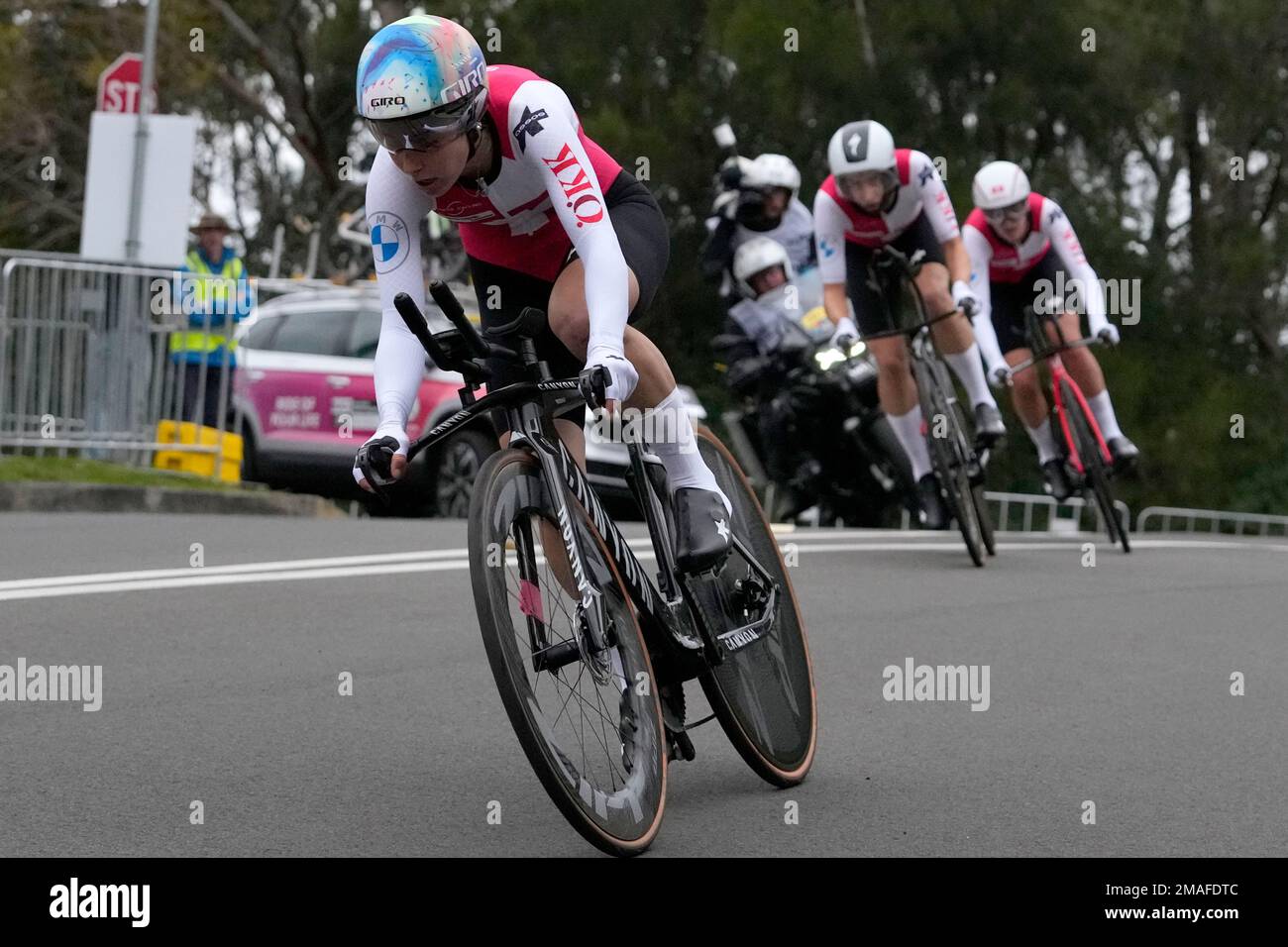 Swiss team riders Elise Chabbey, left, Marlen Reusser and Nicole Koller ...