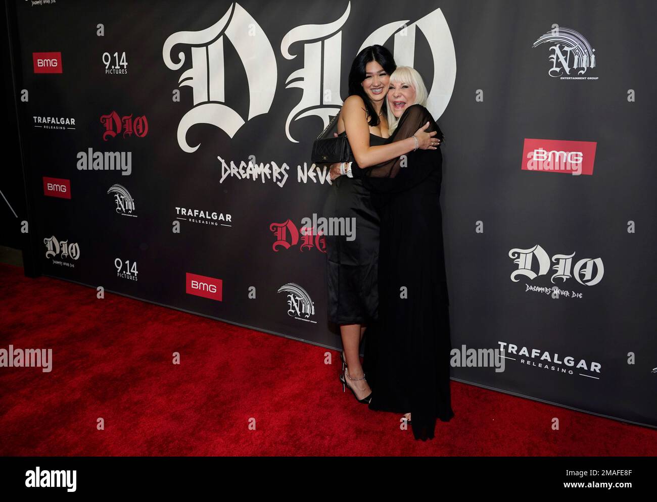 Delilah Dio, left, daughter of the late heavy metal singer Ronnie James ...