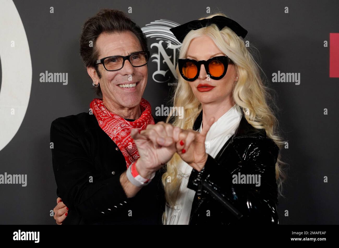 Slim Jim Phantom, left, and Jennie Vee pose together at the premiere of ...
