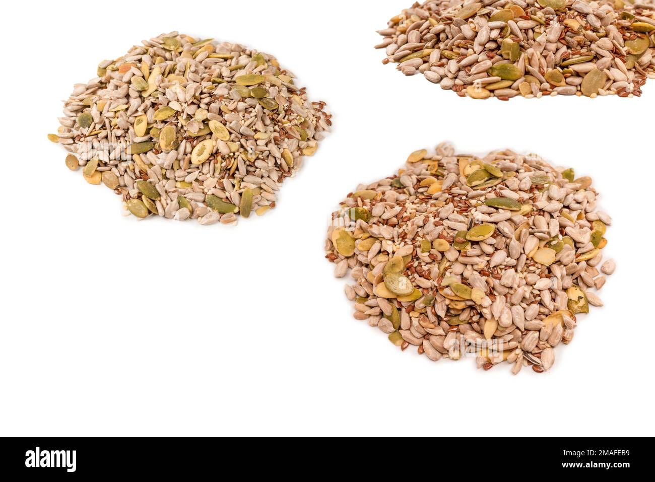 Mixed seeds pile isolated sunflower hi-res stock photography and images ...