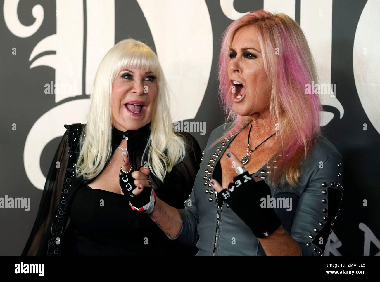 Wendy Dio, left, widow of the late heavy metal singer Ronnie James Dio ...