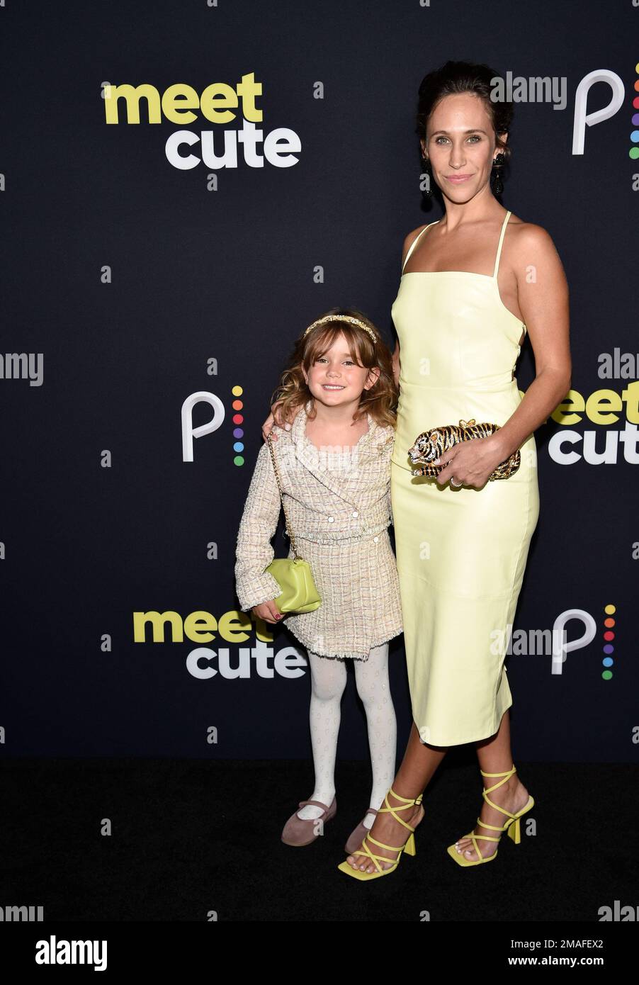 Mia Matysiak, left, and Michelle Fine attend the premiere of "Meet Cute ...