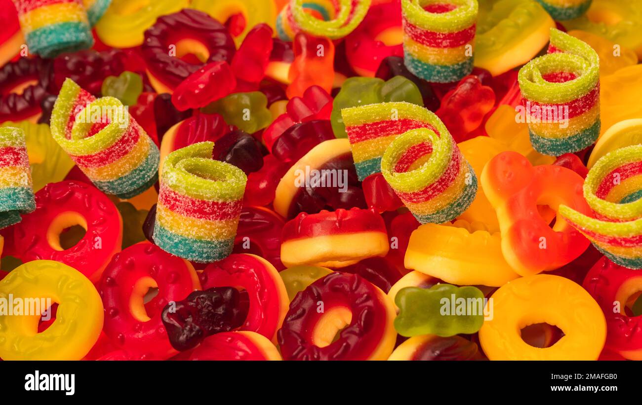Assorted colorful gummy candies. Top view. Jelly donuts. Jelly bears ...