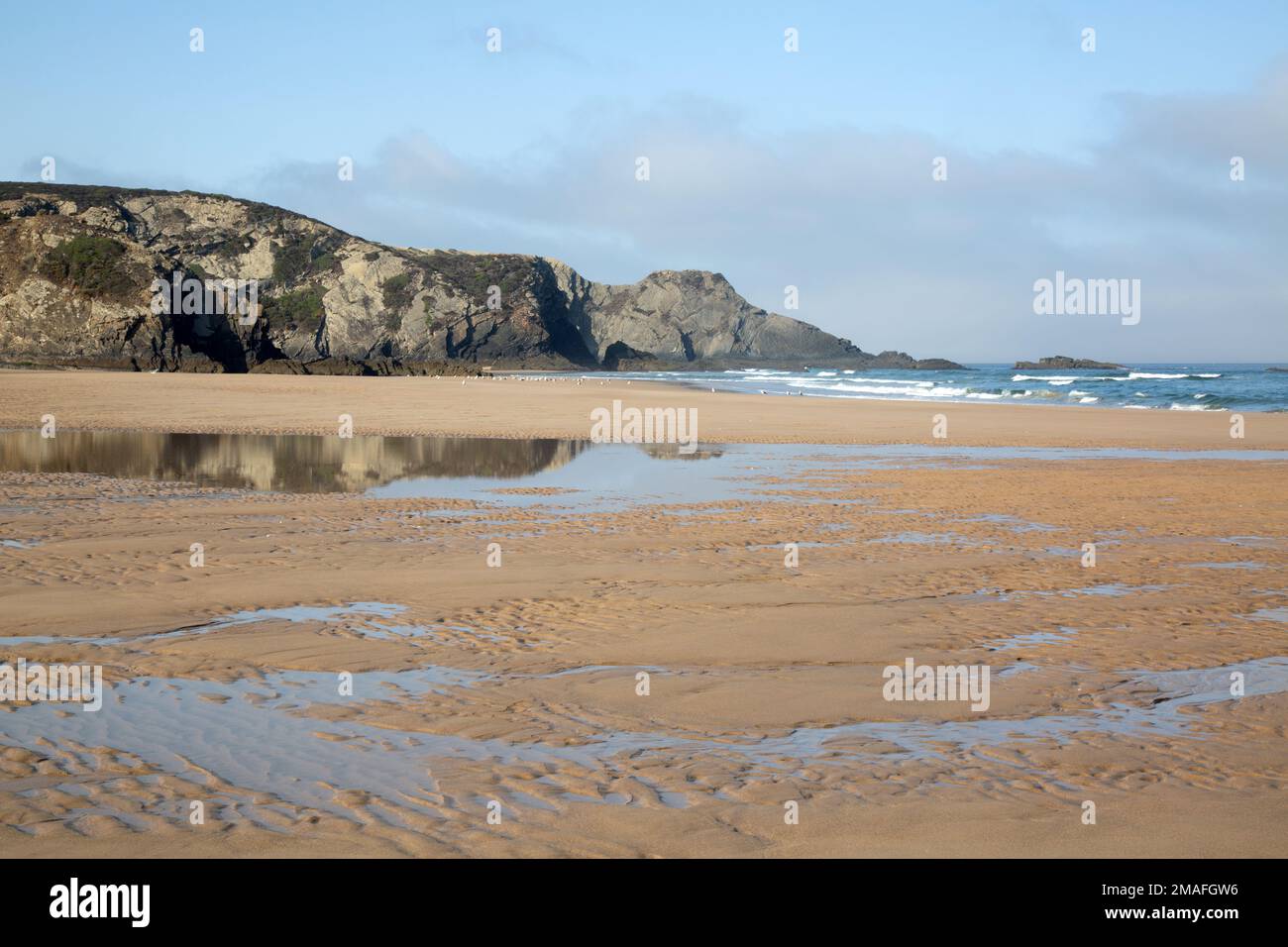 Cliff, Water and Reflection, Odeceixe Beach; Algarve; Portugal Stock ...