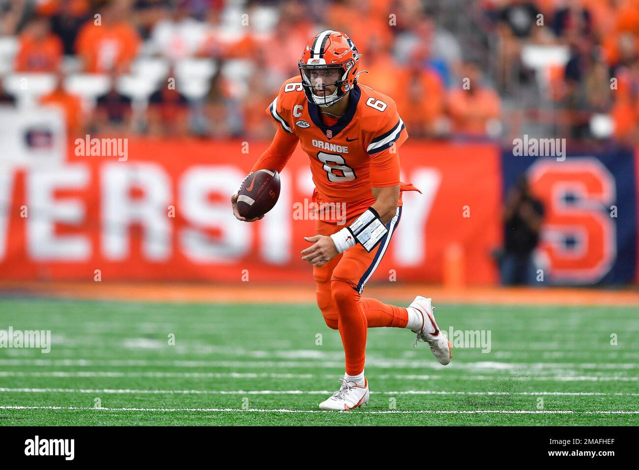 Syracuse quarterback Garrett Shrader runs with the ball during the ...