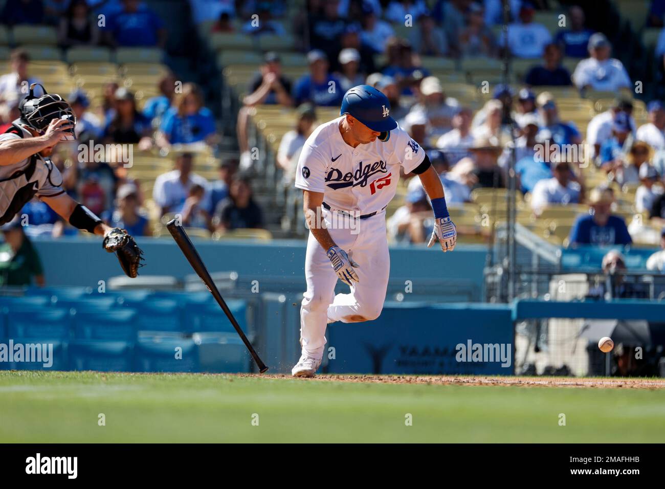 Los Angeles Dodgers catcher Austin Barnes (15) runs to first during the ...