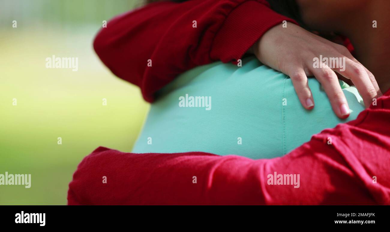 Female friend hug close-up. Girlfriend wrapping arms around in empathic ...