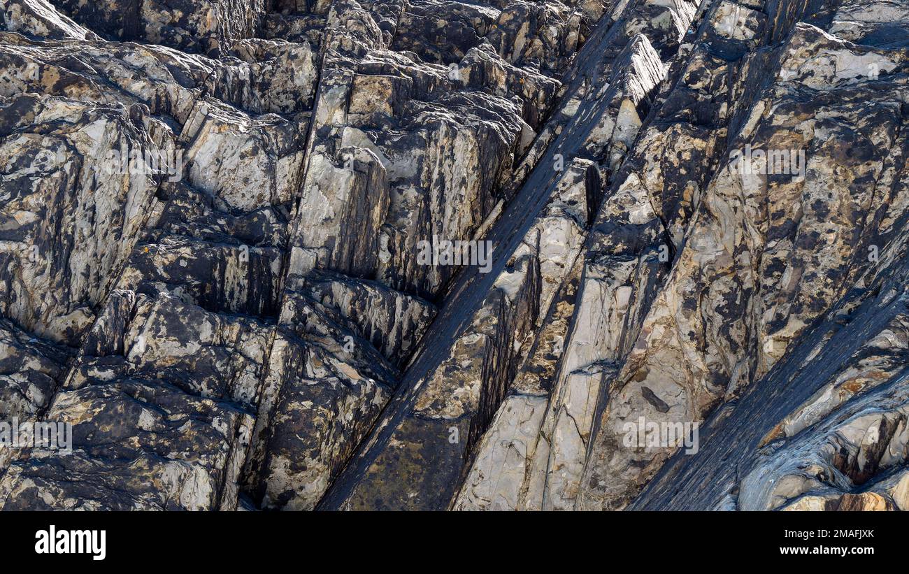 A variety of geological strata as a background. Stone texture, full ...