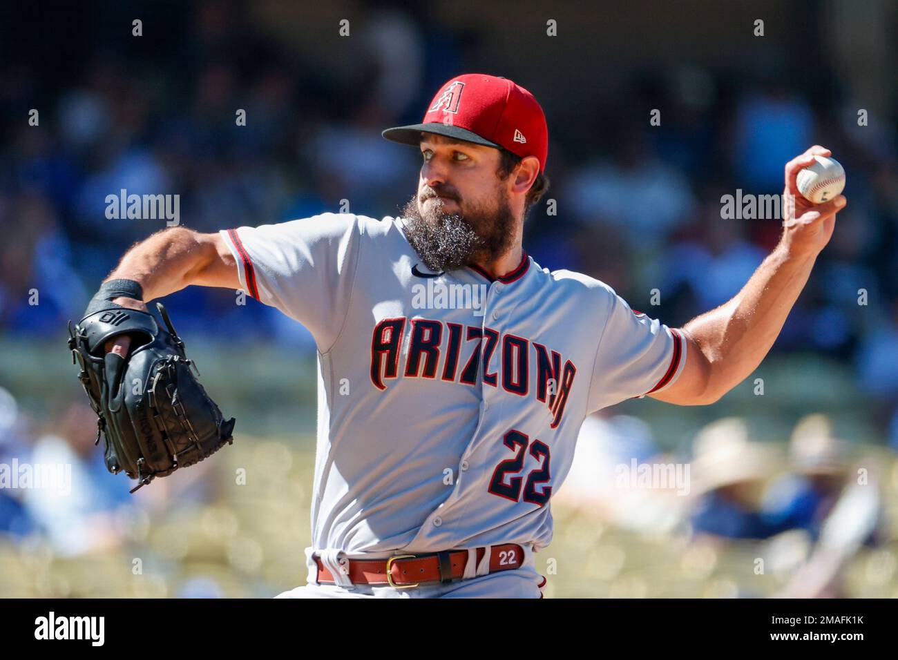 Arizona Diamondbacks relief pitcher Caleb Smith (22) throws to a Los ...