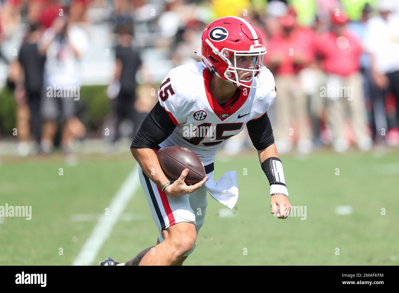 Georgia quarterback Carson Beck (15) runs with the ball during an NCAA ...