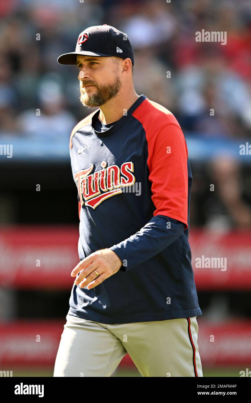 Minnesota Twins manager Rocco Baldelli walks off the field after mound ...