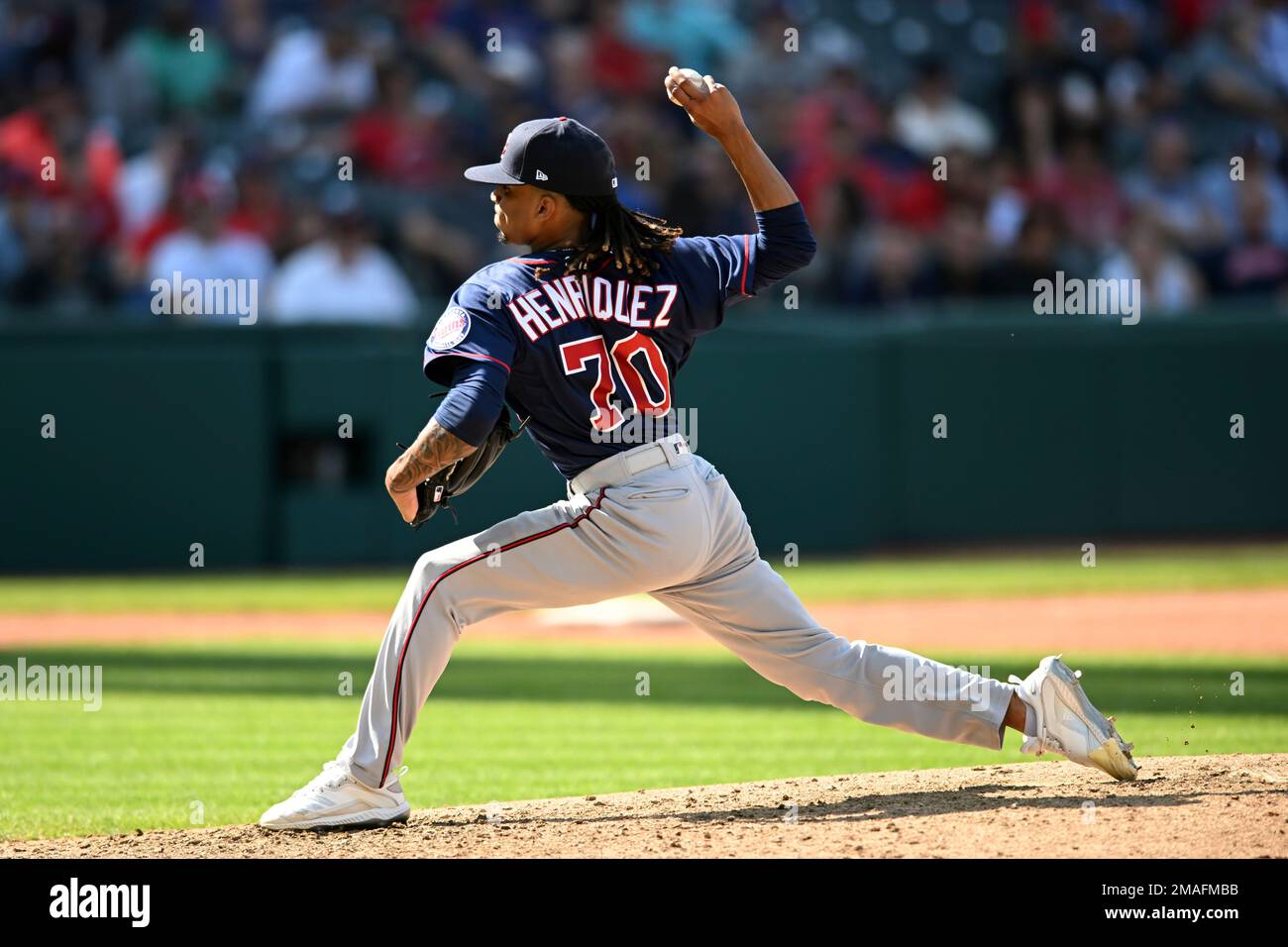Minnesota Twins' Ronny Henriquez delivers during the sixth inning of a ...
