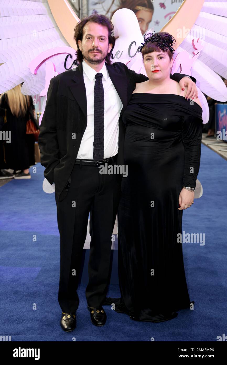 Luis Felber, left, and director Lena Dunham pose for photographers upon ...