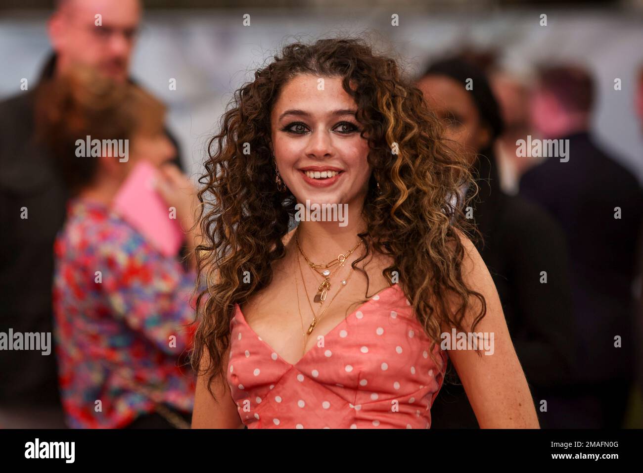 Isis Hainsworth poses for photographers upon arrival for the UK ...