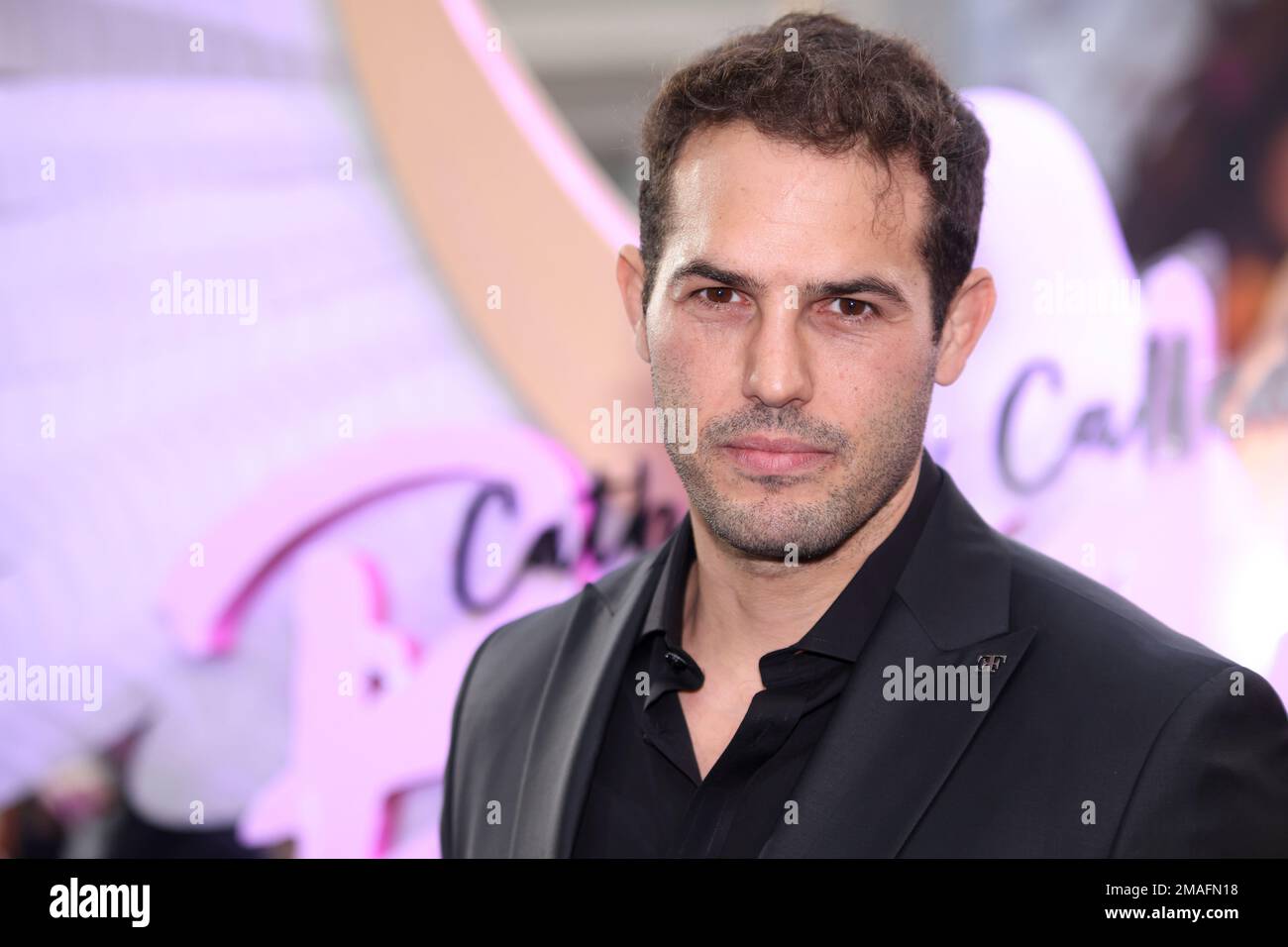 Jeremy Parisi poses for photographers upon arrival for the UK premiere ...