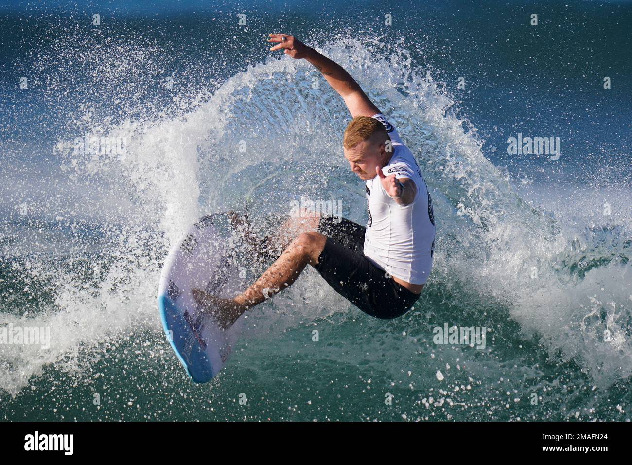 Jackson Baker, of Australia, competes during the ISA World Surfing ...
