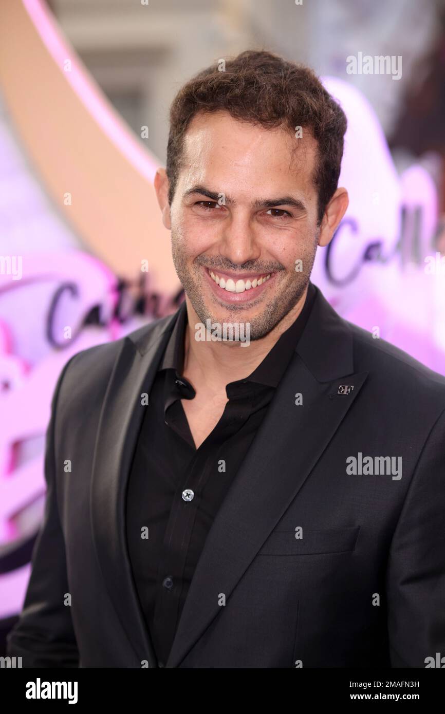 Jeremy Parisi poses for photographers upon arrival for the UK premiere ...