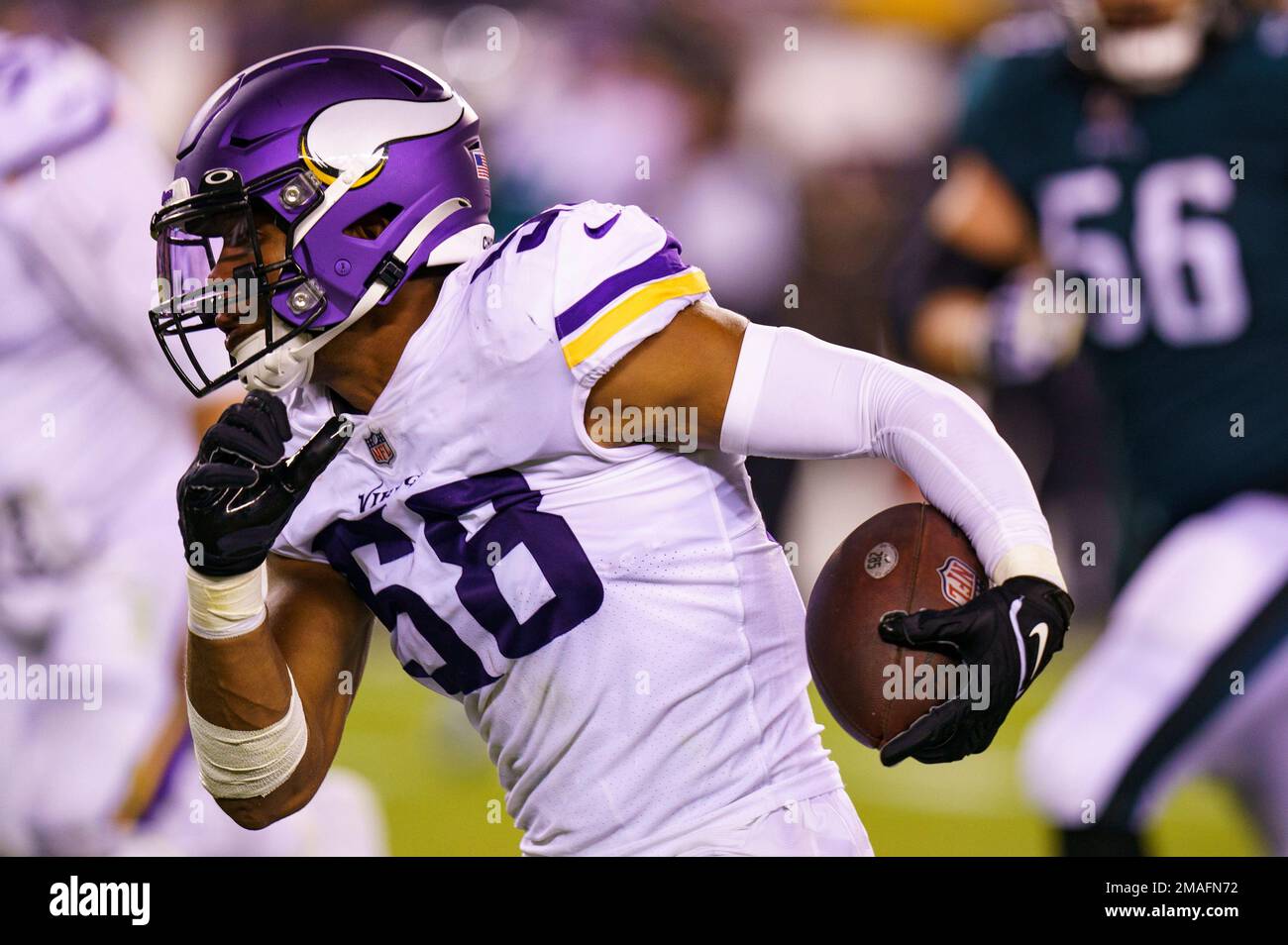 Minnesota Vikings linebacker Jordan Hicks (58) returns the interception ...