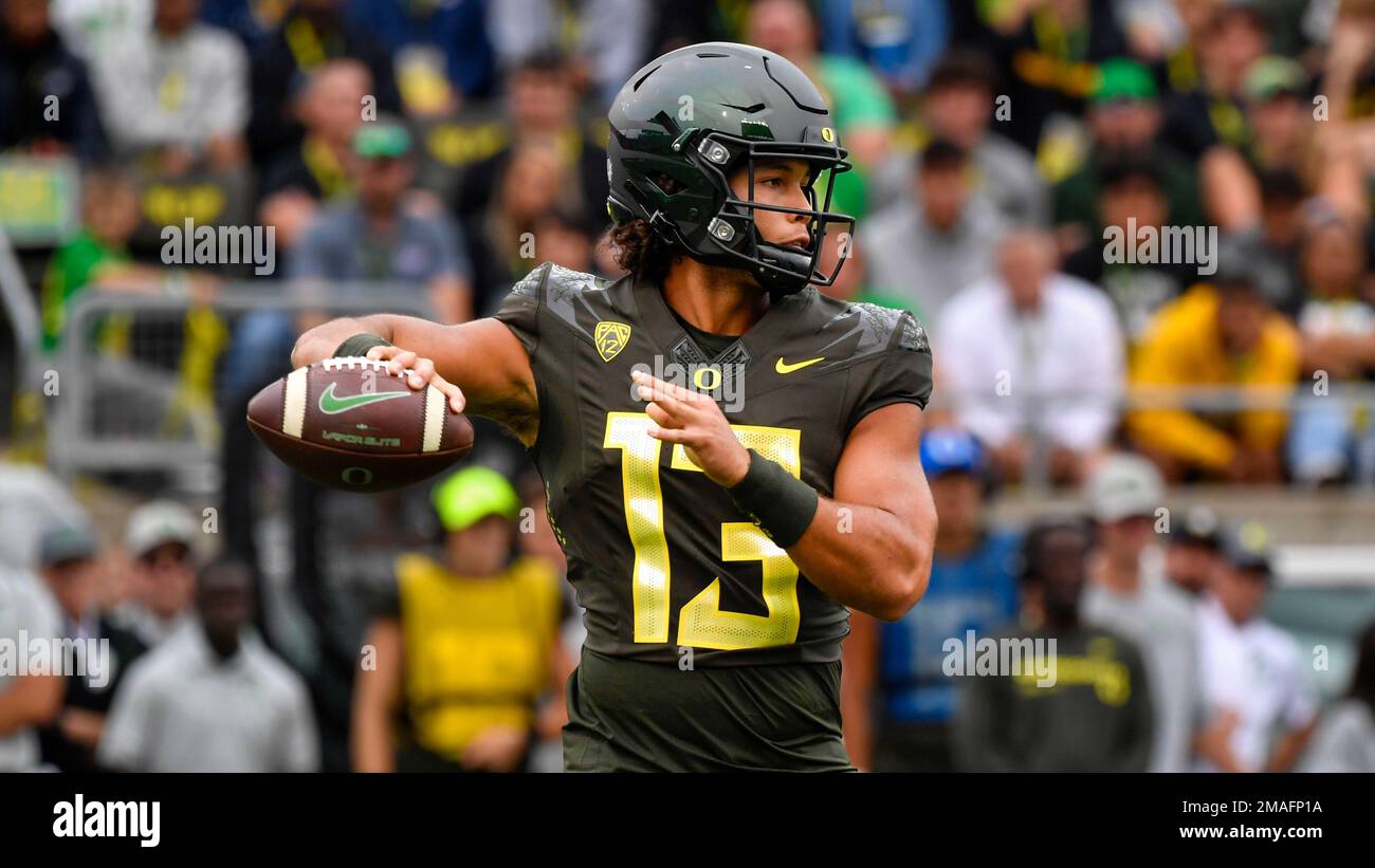 Oregon quarterback Ty Thompson (13) throws against BYU during the ...