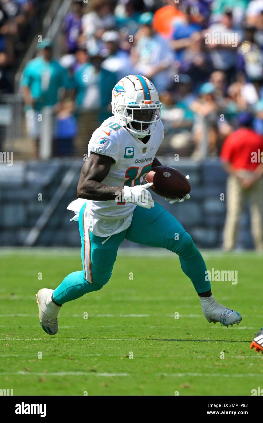 Miami Dolphins wide receiver Tyreek Hill (10) runs with the ball after ...
