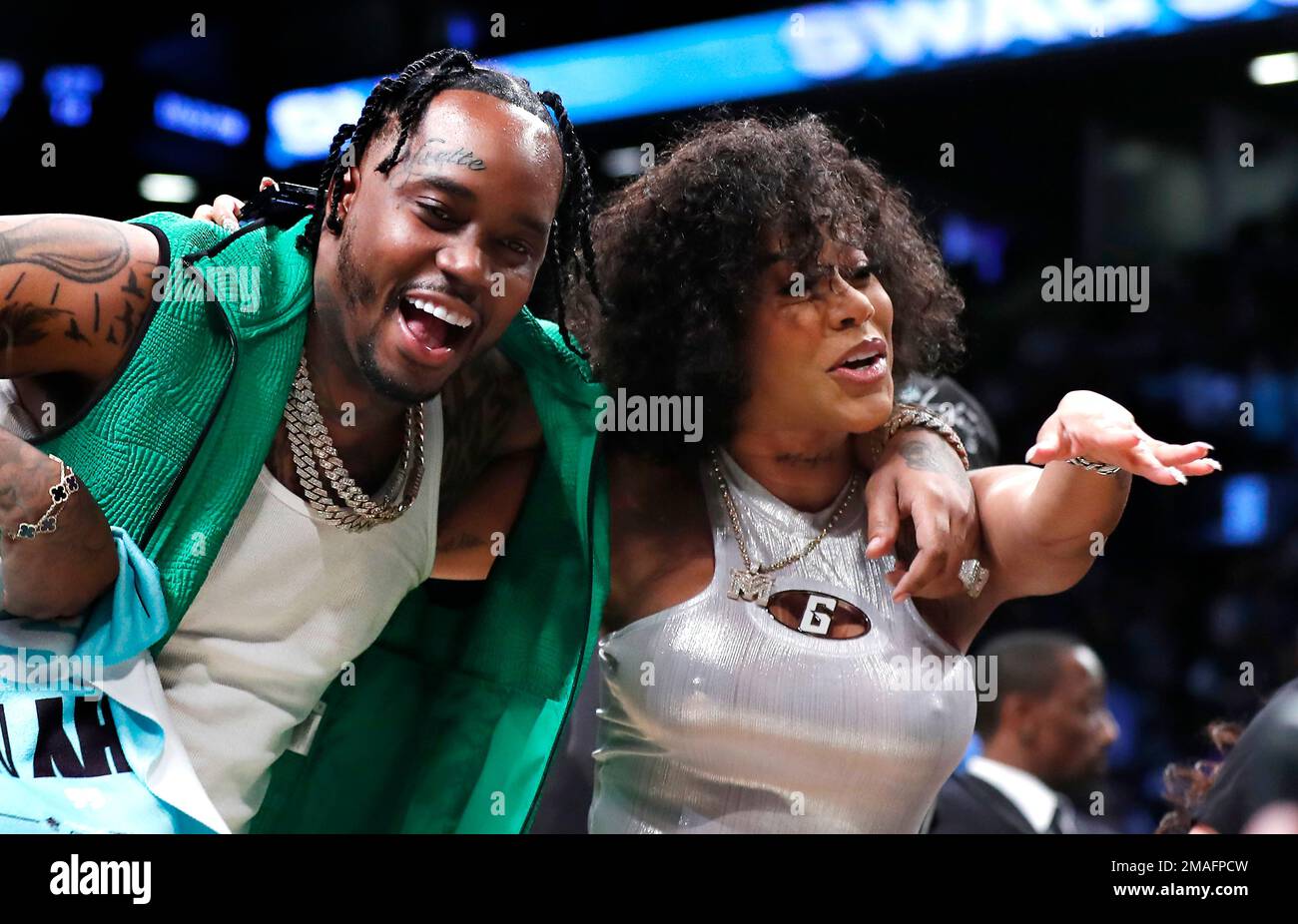 Rapper Five Foreign and Jasmine Giselle seen court side attending the ...