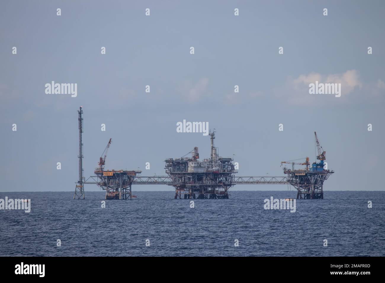 Oil refinery platform at the open sea, producing black gold, Aegean Sea ...