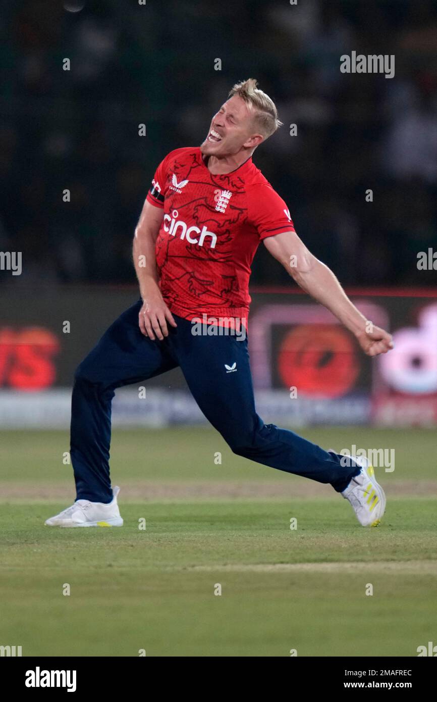 England's Luke Wood celebrates the dismissal of Pakistan's Mohammad ...
