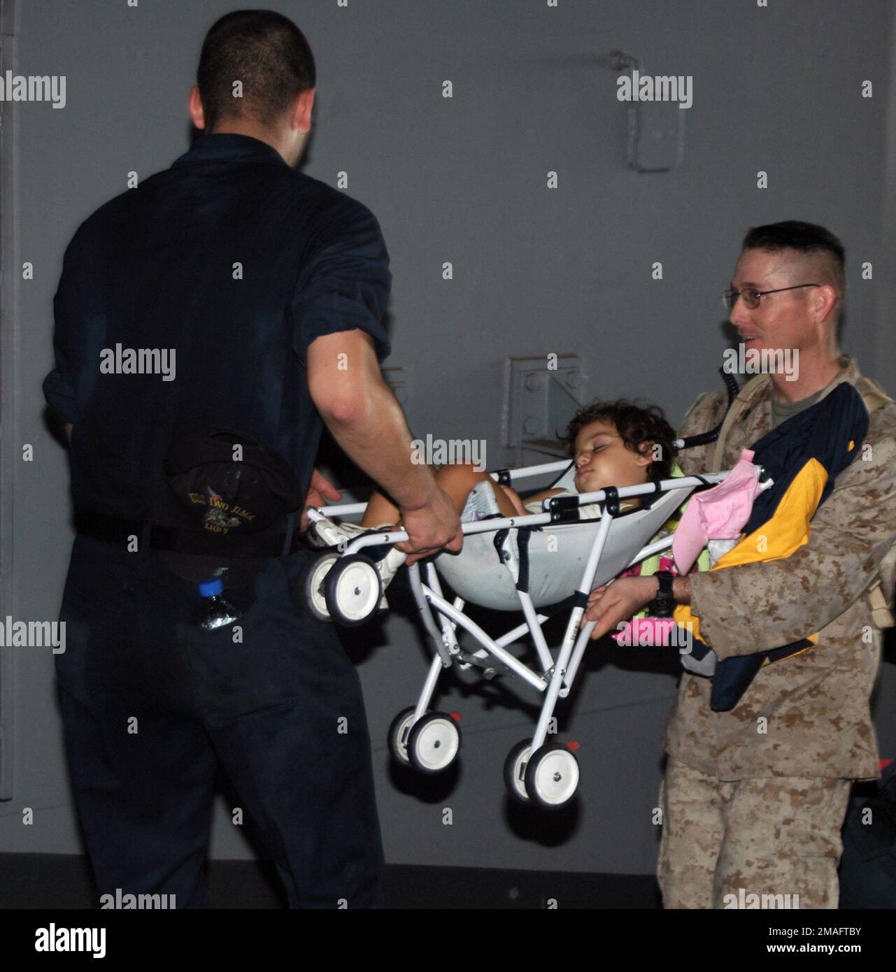 060723-N-6403R-009. [Complete] Scene Caption: A US Navy (USN) Sailor ...