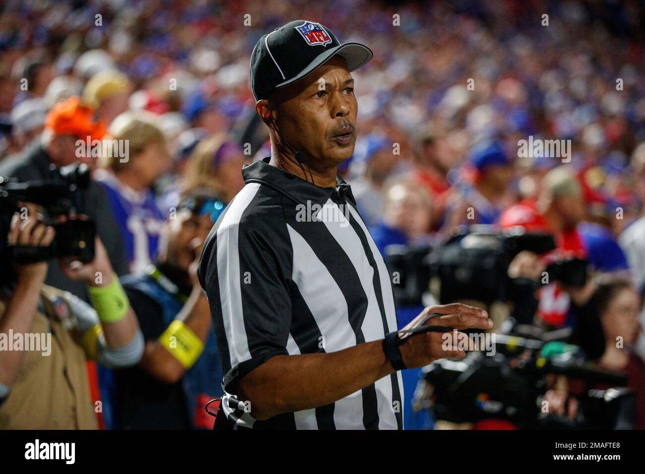 Field judge Dyrol Prioleau (109) counts during an NFL football game ...