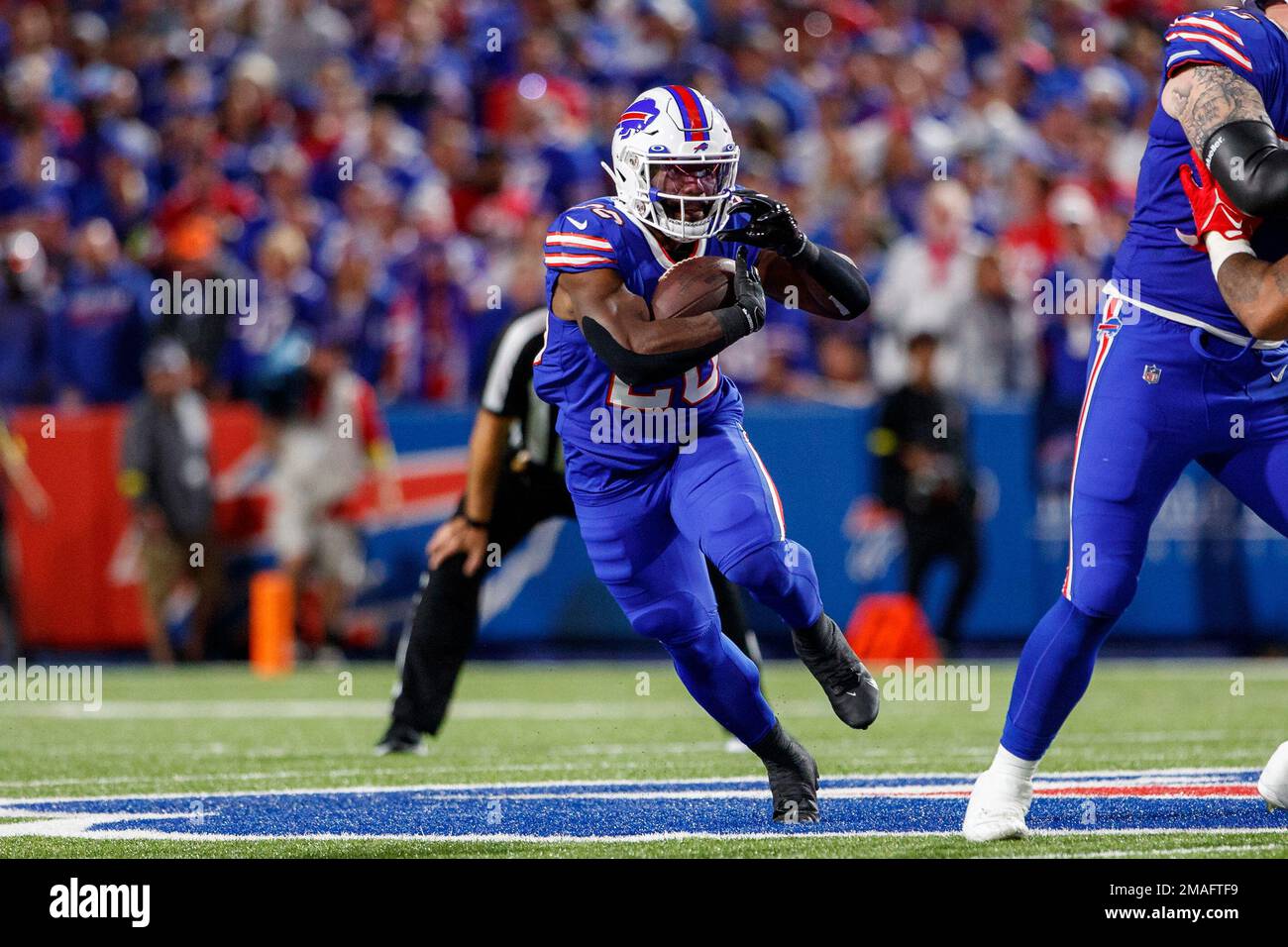Buffalo Bills running back Zack Moss (20) rushes during an NFL football ...