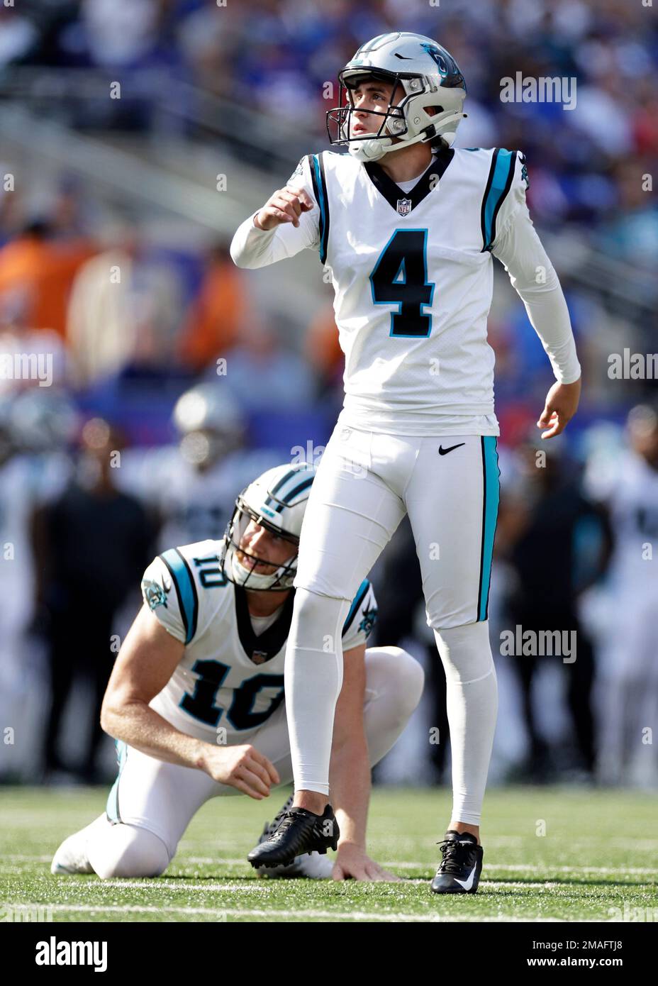 Carolina Panthers place kicker Eddy Pineiro (4) kicks a field goal ...