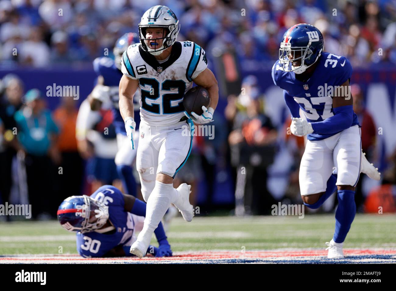 Carolina Panthers running back Christian McCaffrey (22) runs with the ...