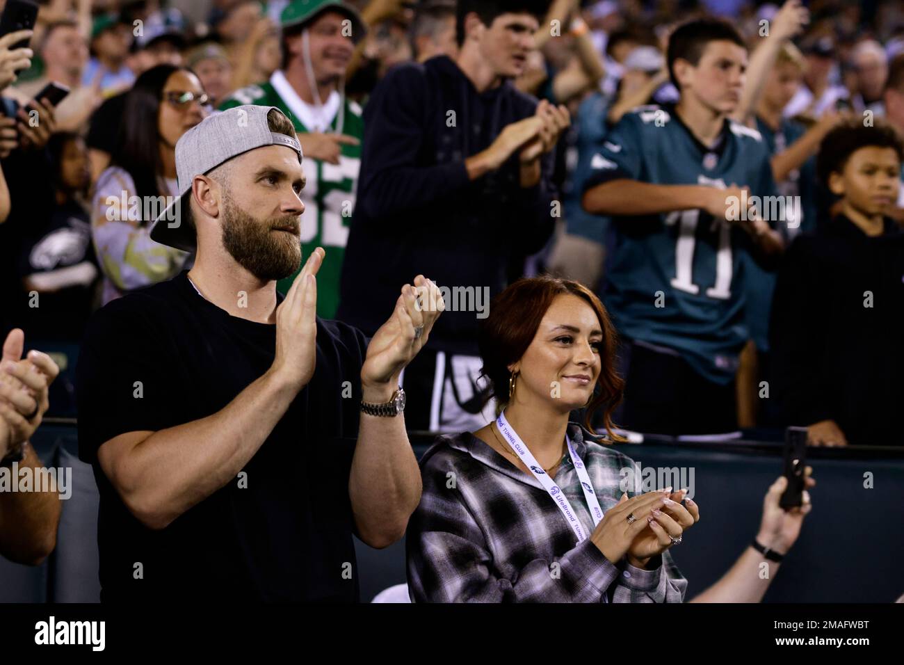 Philadelphia Phillies star Bryce Harper watches an NFL football game ...