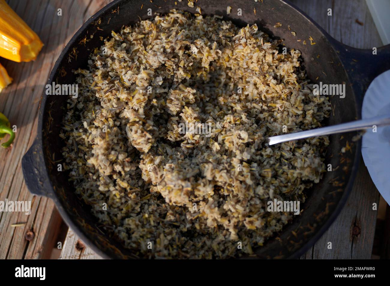 A fresh pot of hand-harvested and processed wild rice is shared by ...