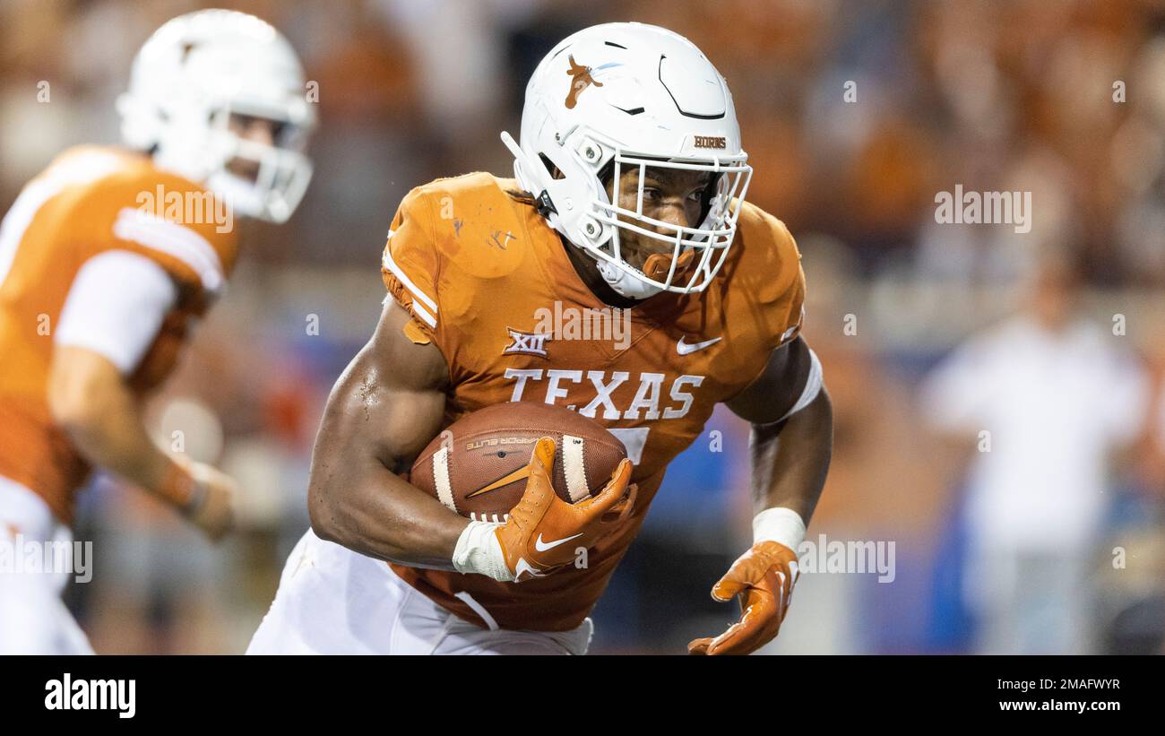 Texas running back Bijan Robinson (5) looks for more yards against UTSA ...