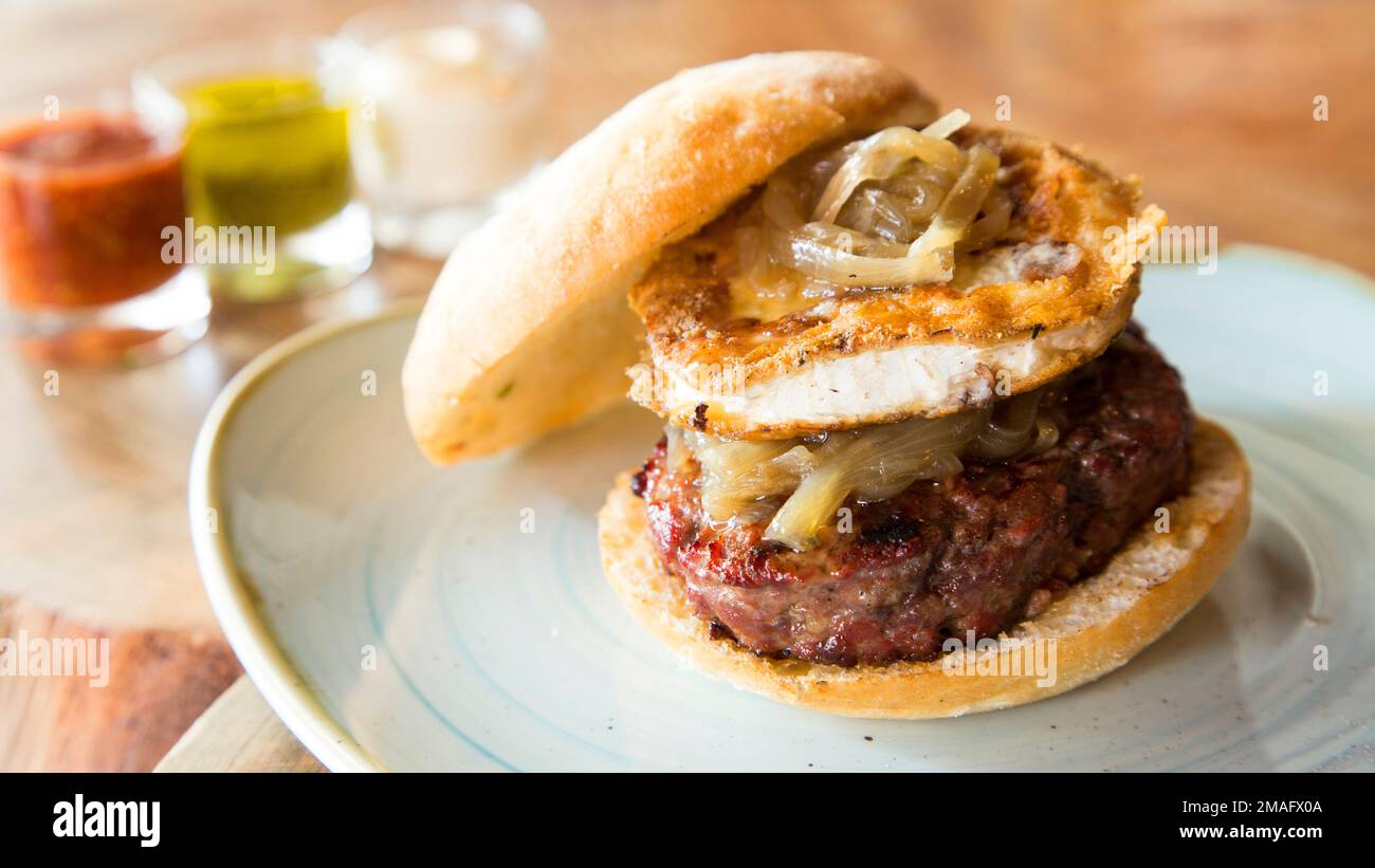Authentic top quality American Burger with grilled goat cheese Stock ...