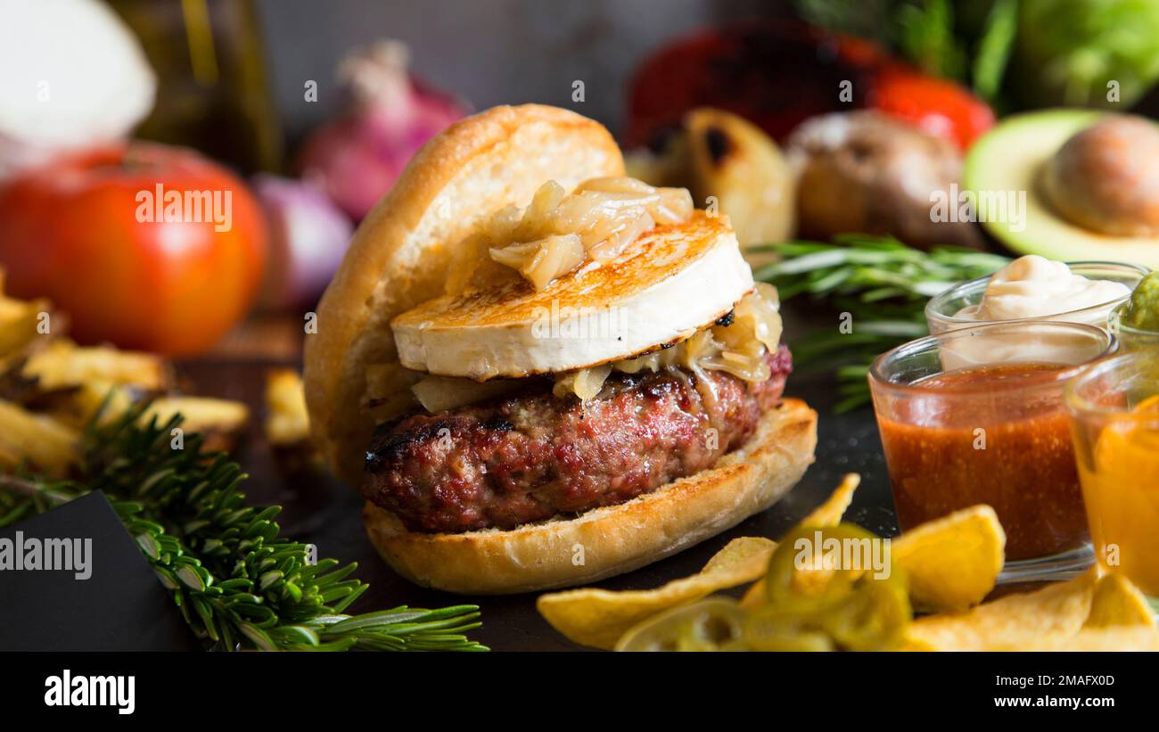 Authentic top quality American Burger with grilled goat cheese Stock ...