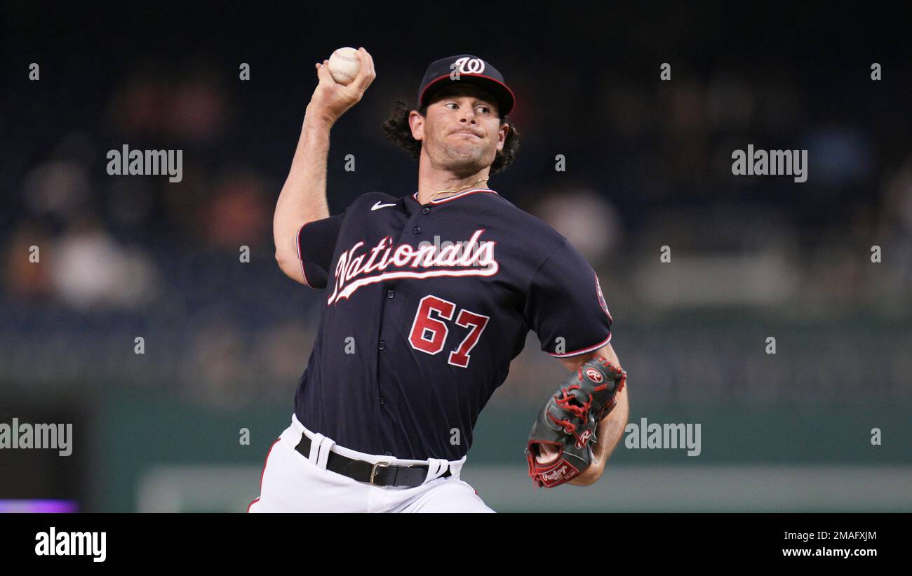 Washington Nationals relief pitcher Kyle Finnegan throws to the Miami ...