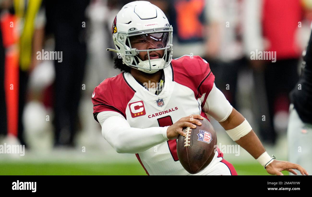 Arizona Cardinals quarterback Kyler Murray (1) runs out of the pocket ...