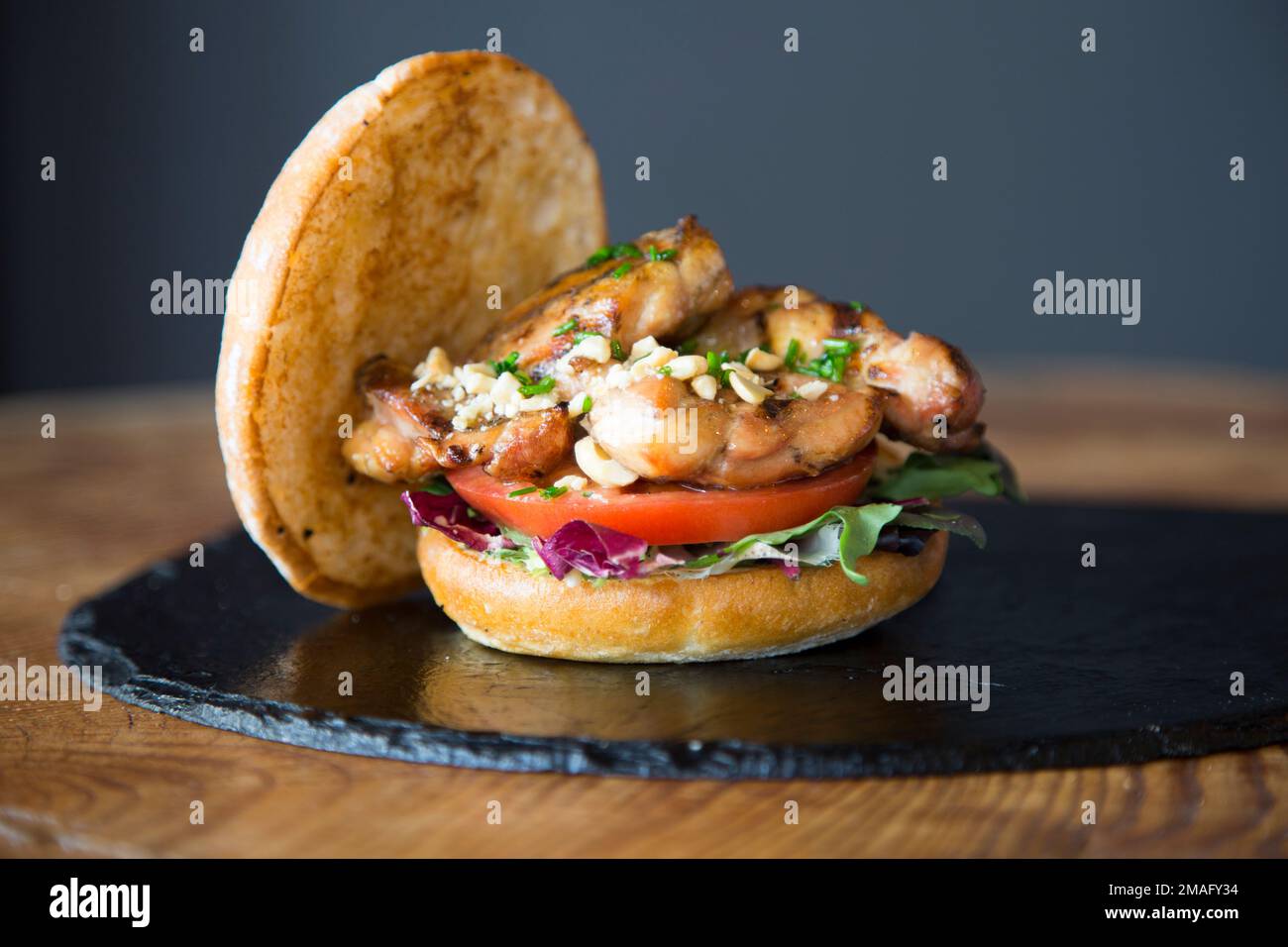 Tasty black burger chicken hi-res stock photography and images - Alamy